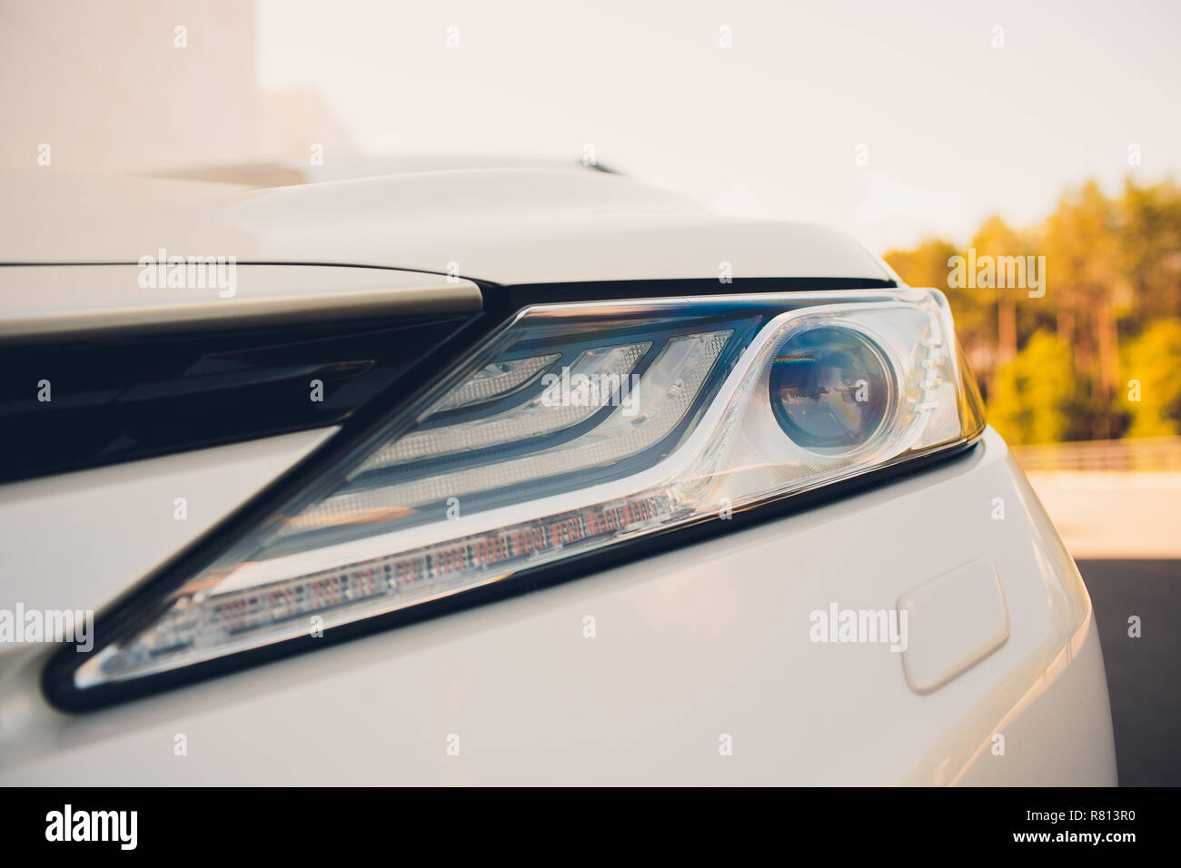 The new car white headlights are beautiful Stock Photo - Alamy