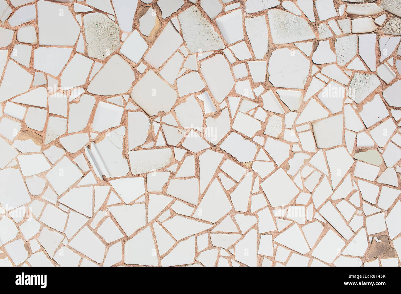 Broken tiles white pattern wall texture background Stock Photo - Alamy