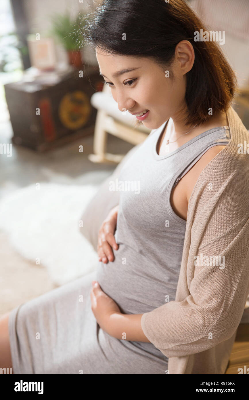 Pregnant women to family life Stock Photo - Alamy