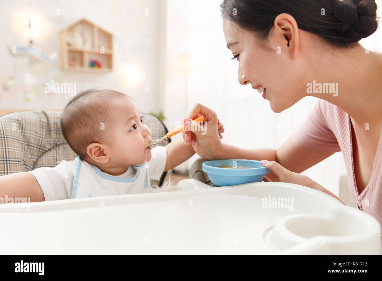 Mother to feed the baby Stock Photo - Alamy
