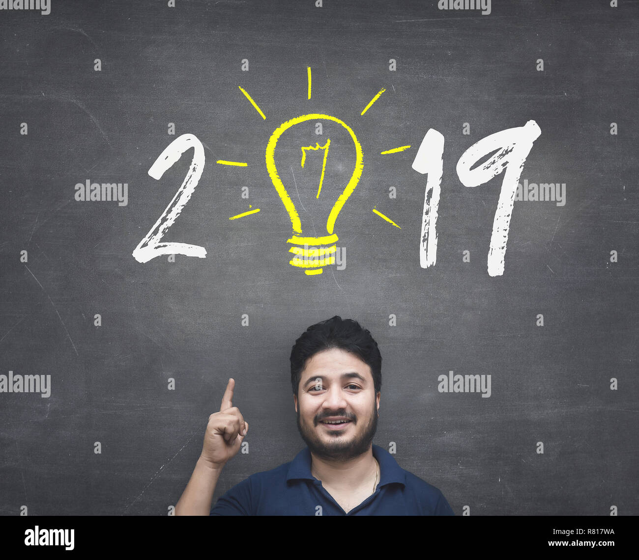 Thinking Position of A Young Asian Man while standing against ...