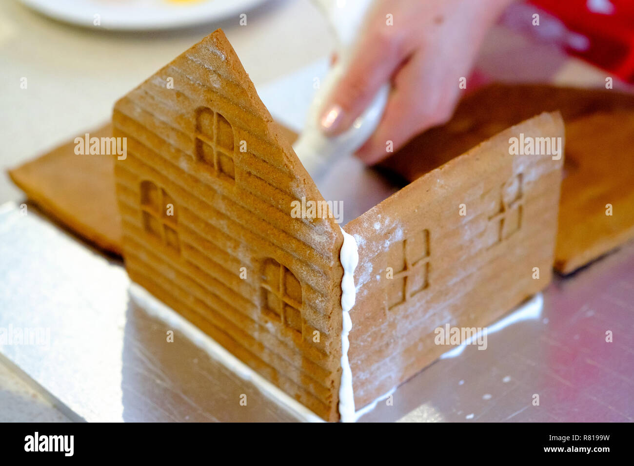 Step-by-step photos of the construction of a gingerbread house Stock ...
