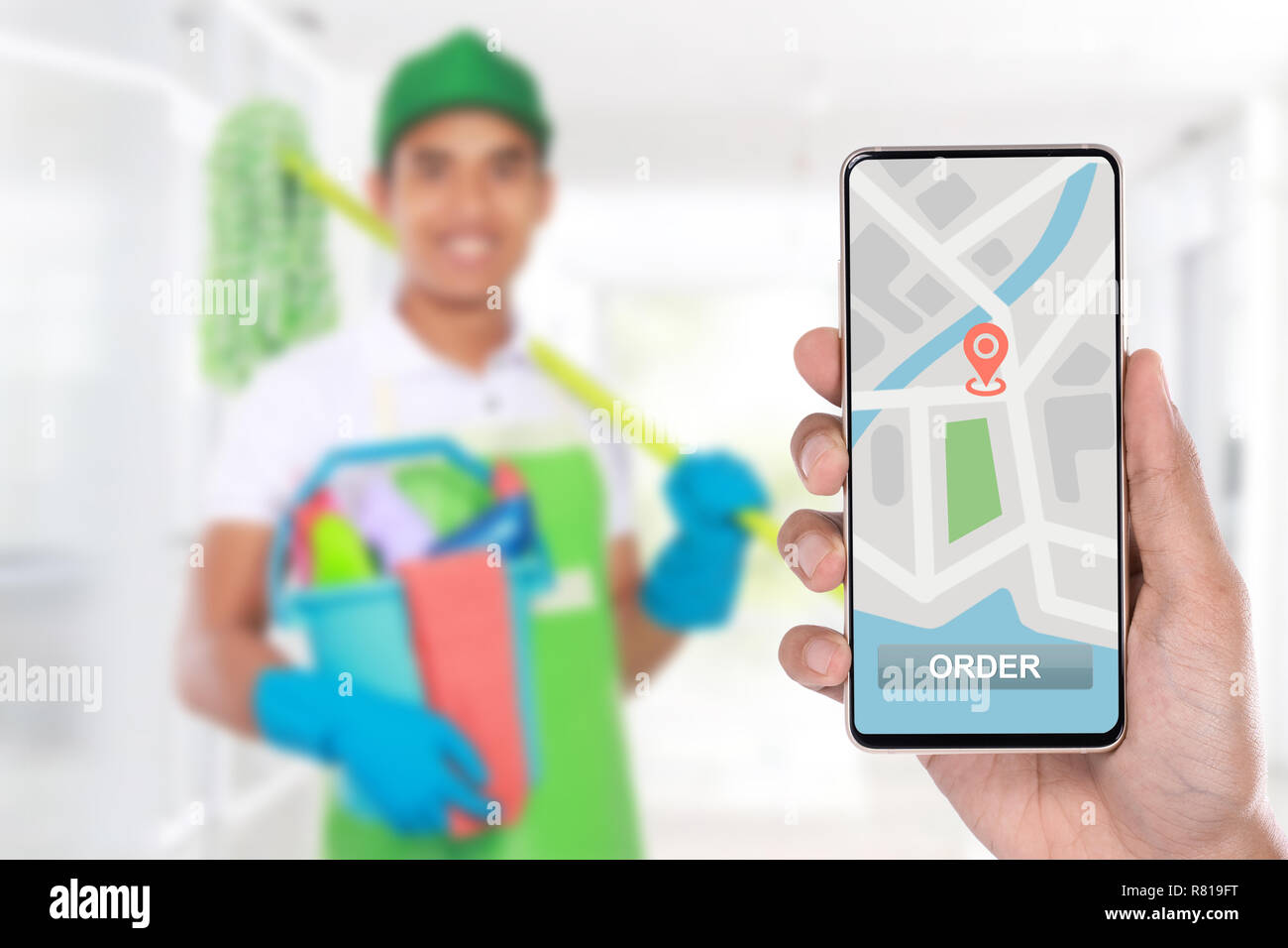 Cleaning worker smartphone hi-res stock photography and images - Alamy