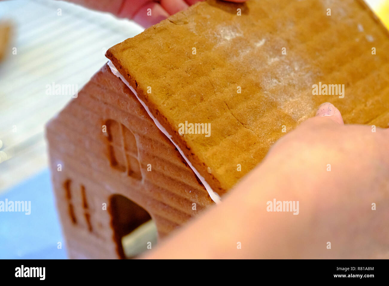 Step-by-step photos of the construction of a gingerbread house Stock ...