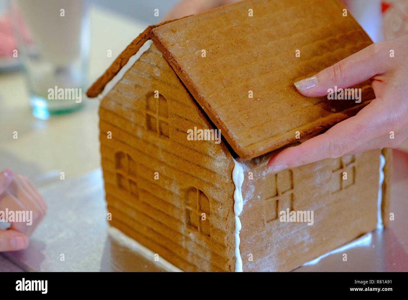 Step-by-step photos of the construction of a gingerbread house Stock ...