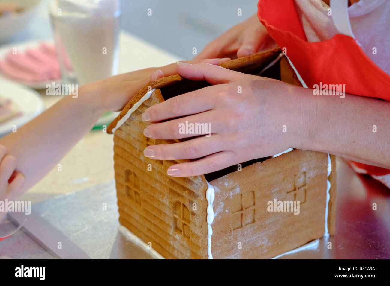 Step-by-step photos of the construction of a gingerbread house Stock ...