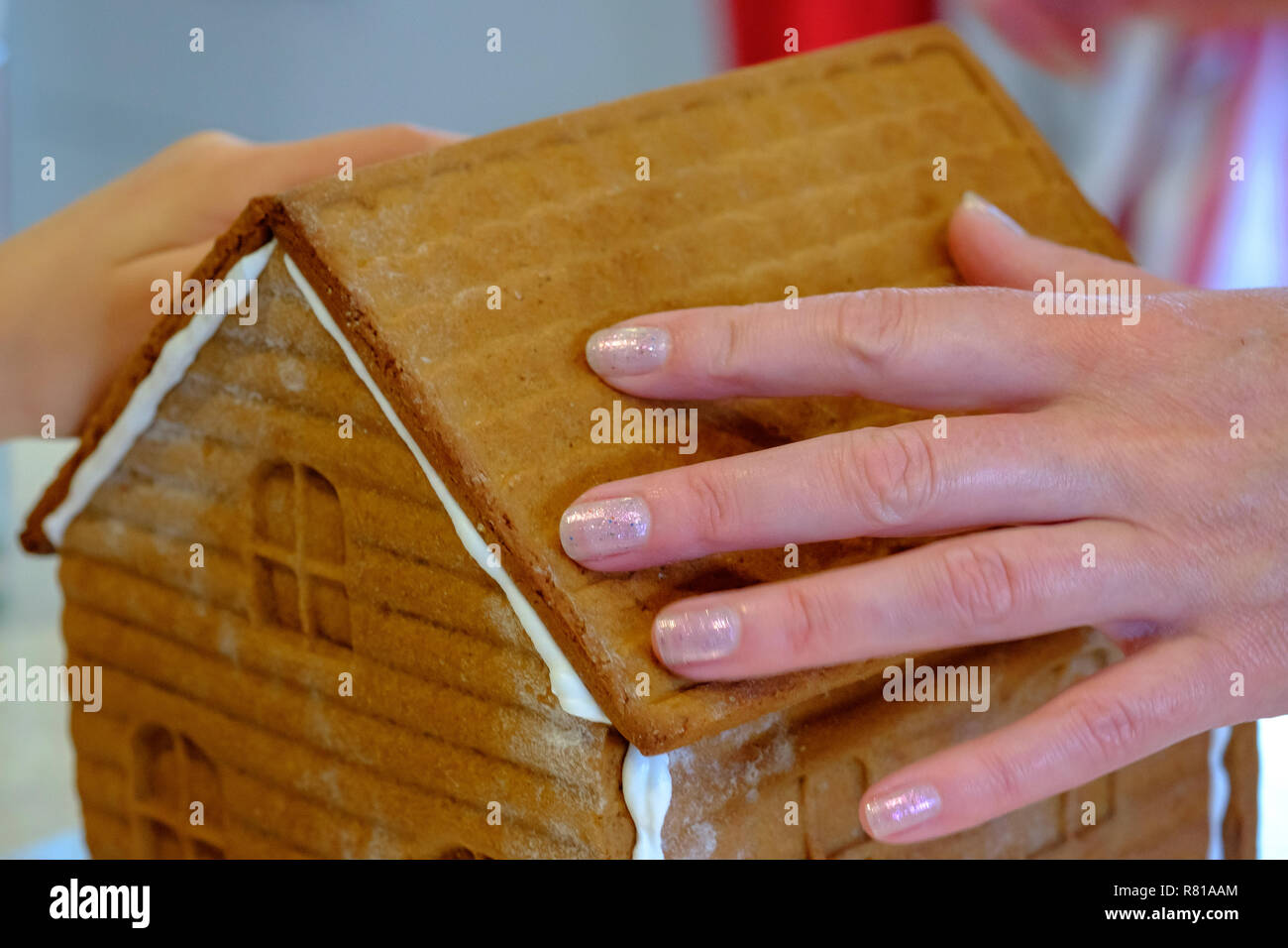 Step-by-step photos of the construction of a gingerbread house Stock ...