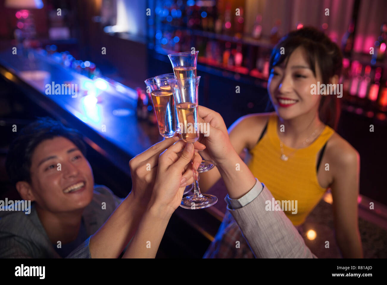 Young people drink at the bar Stock Photo - Alamy