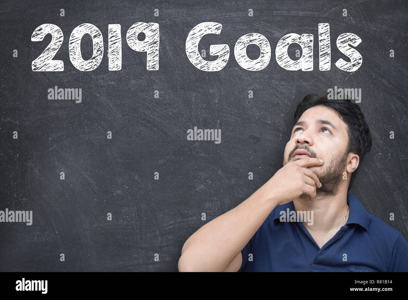 Thinking Position of A Young Asian Man while standing against ...