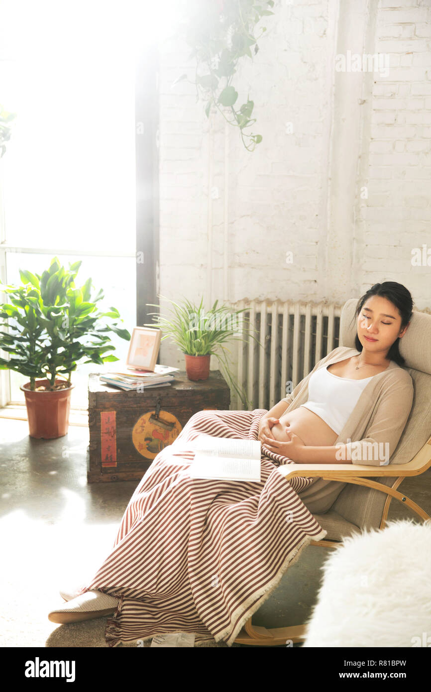 Pregnant women to family life Stock Photo - Alamy