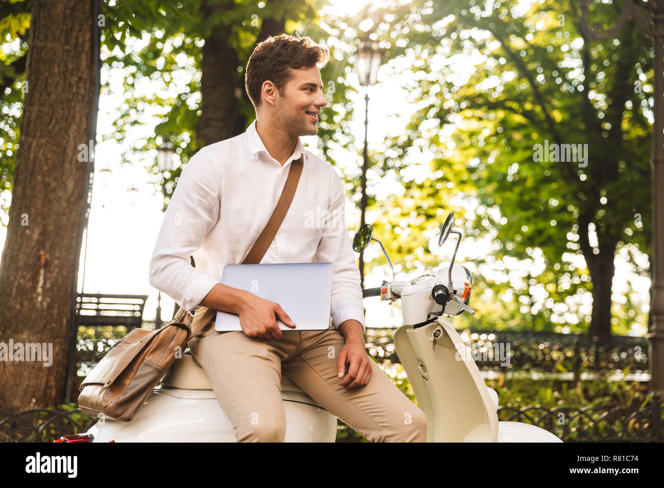 Businessman commuting on motorcycle hi-res stock photography and images ...