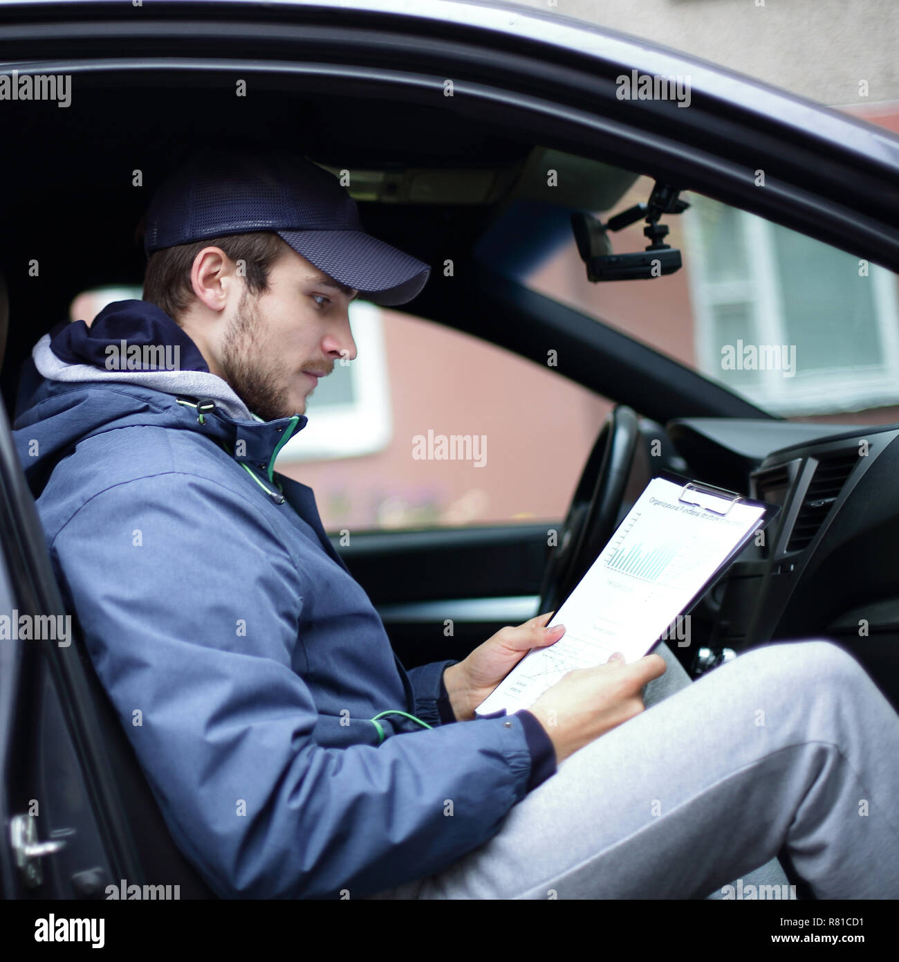 Man sitting in automobile hi-res stock photography and images - Alamy