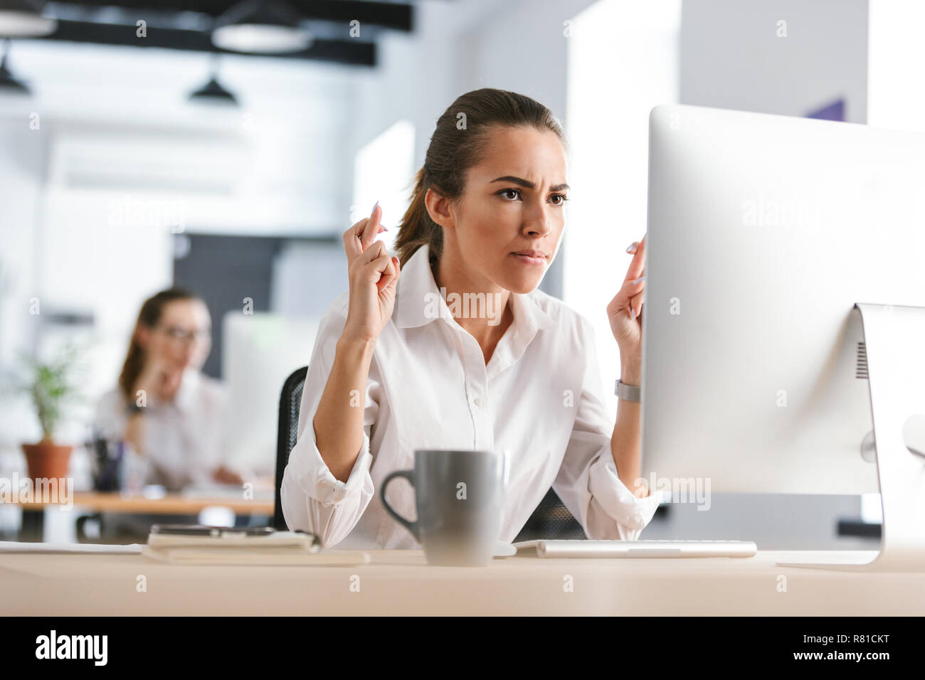 Photo of a nervous business woman in office working with computer make ...
