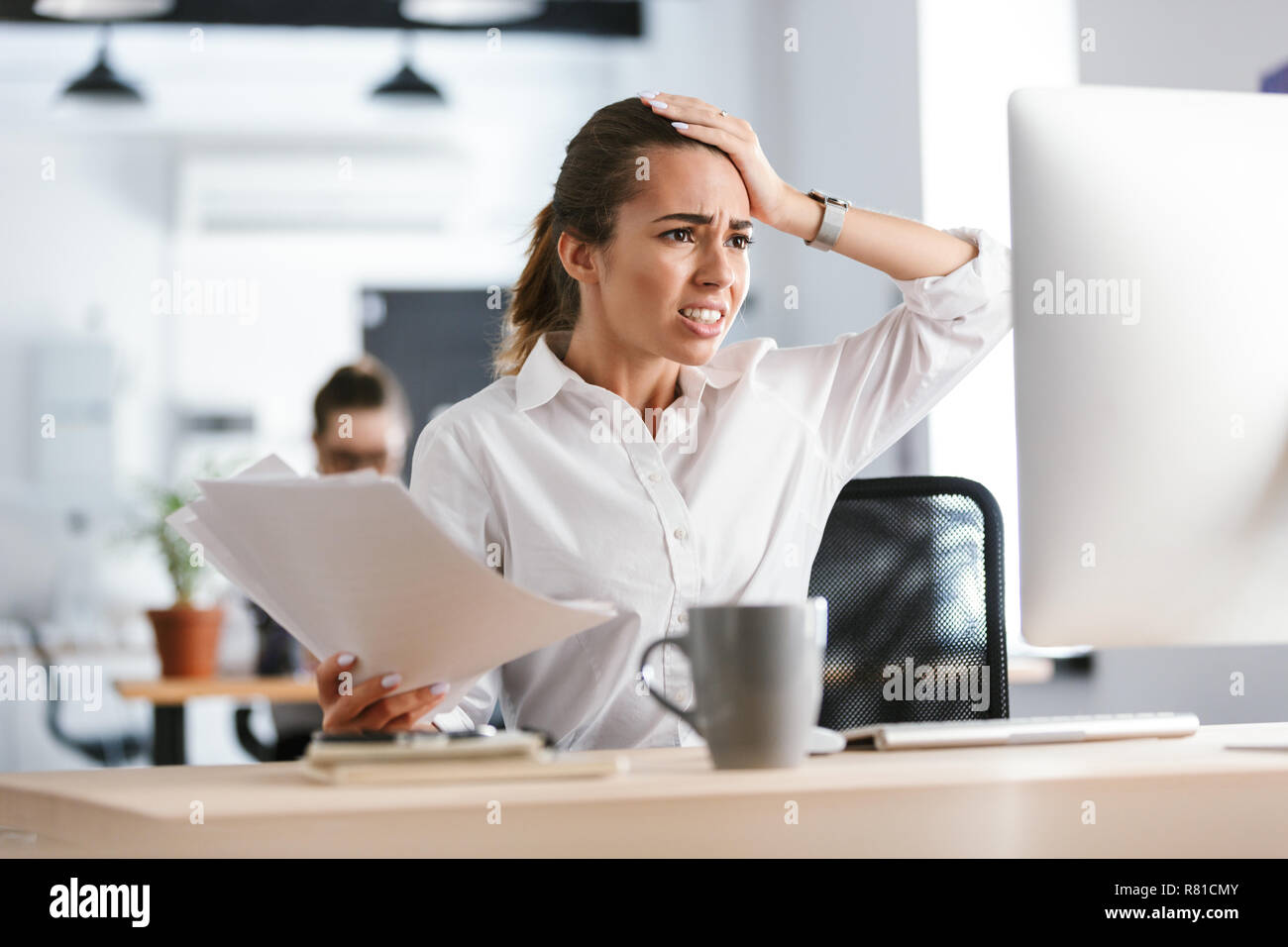 Confused Woman At Computer