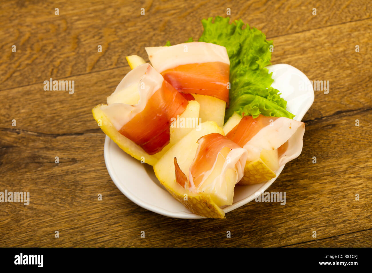 Spanish Hamon with melon Stock Photo - Alamy