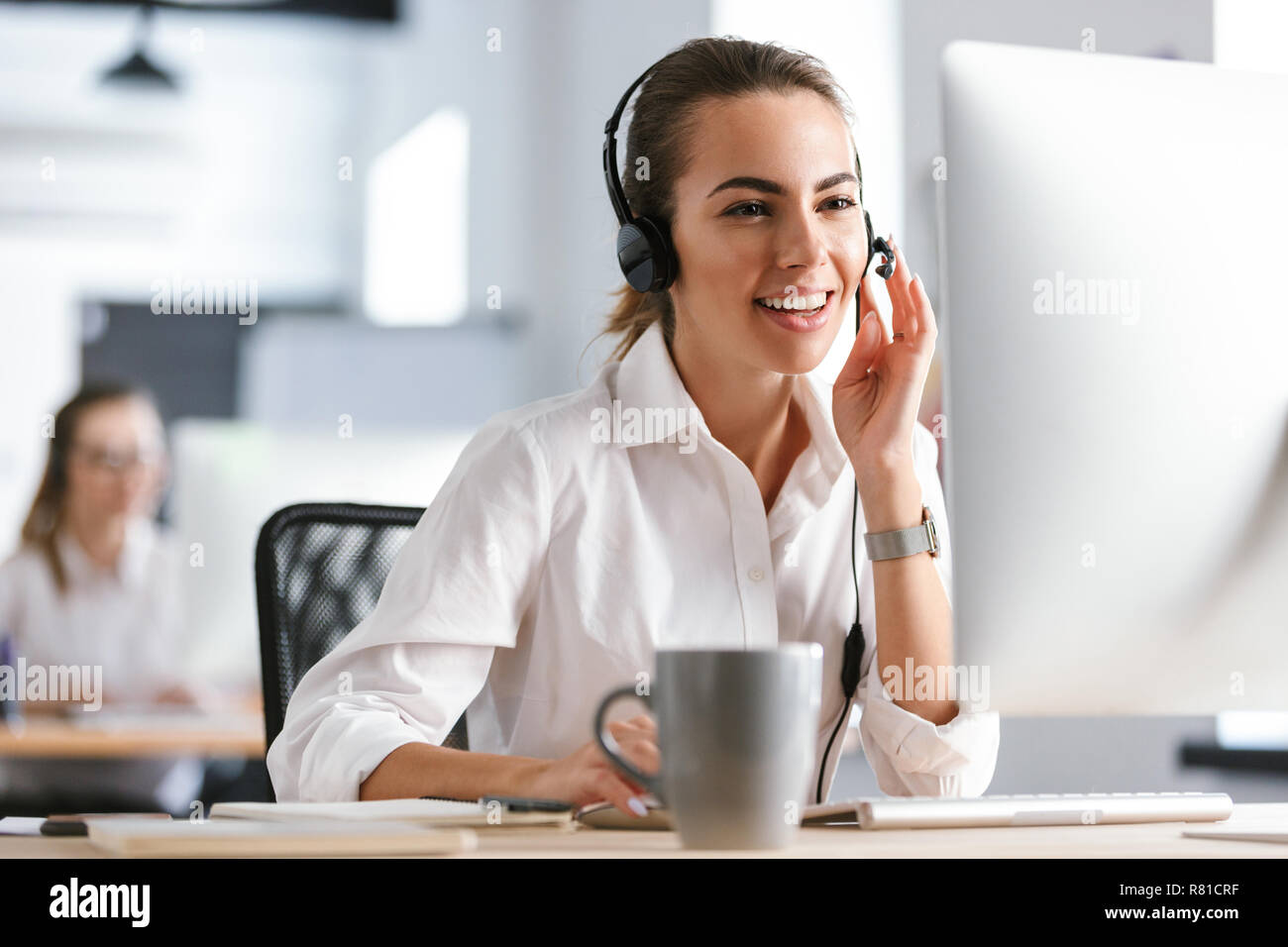 Image of a happy emotional business woman in office callcenter working ...