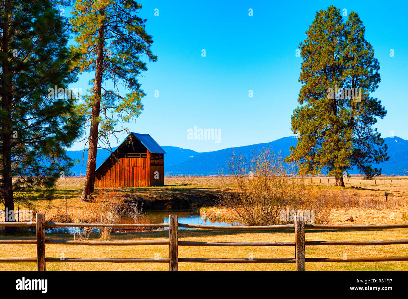 Red shed sits in a high desert ranch setting near Fort Klamath, Oregon ...