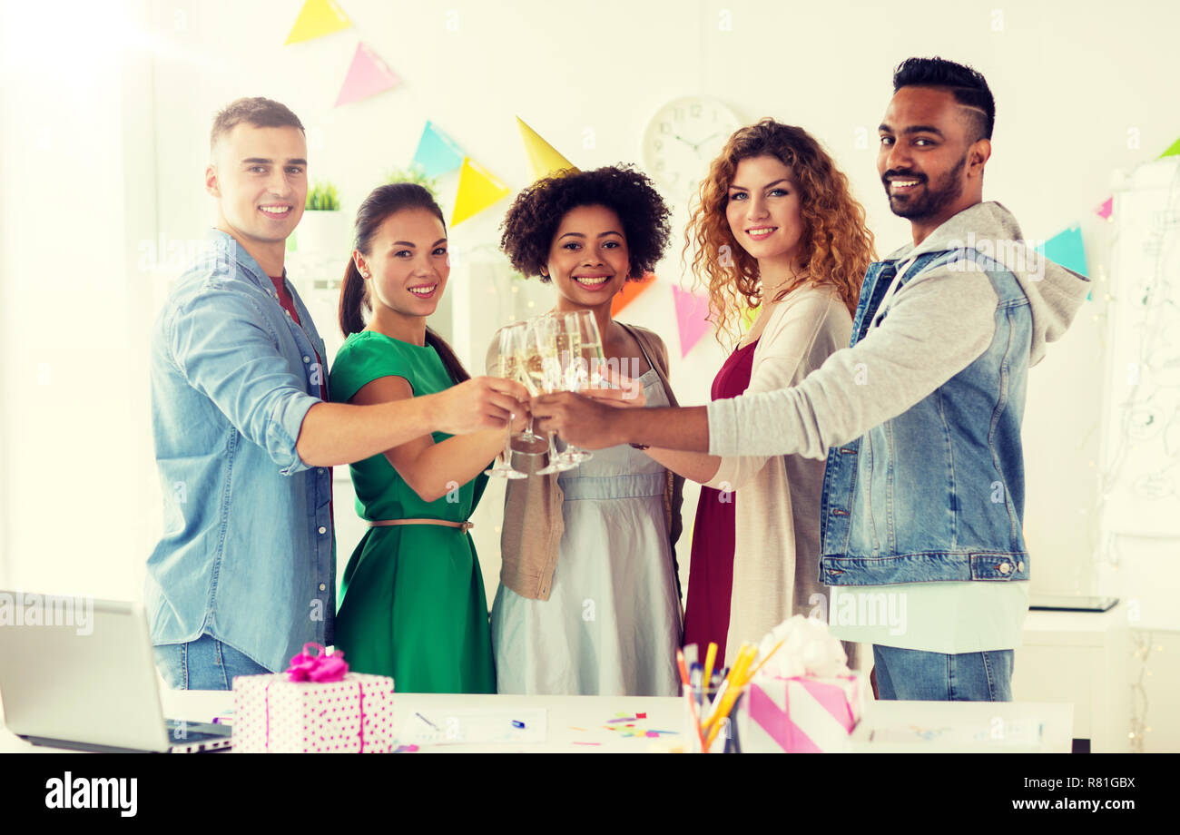 happy team with champagne at office birthday party Stock Photo - Alamy