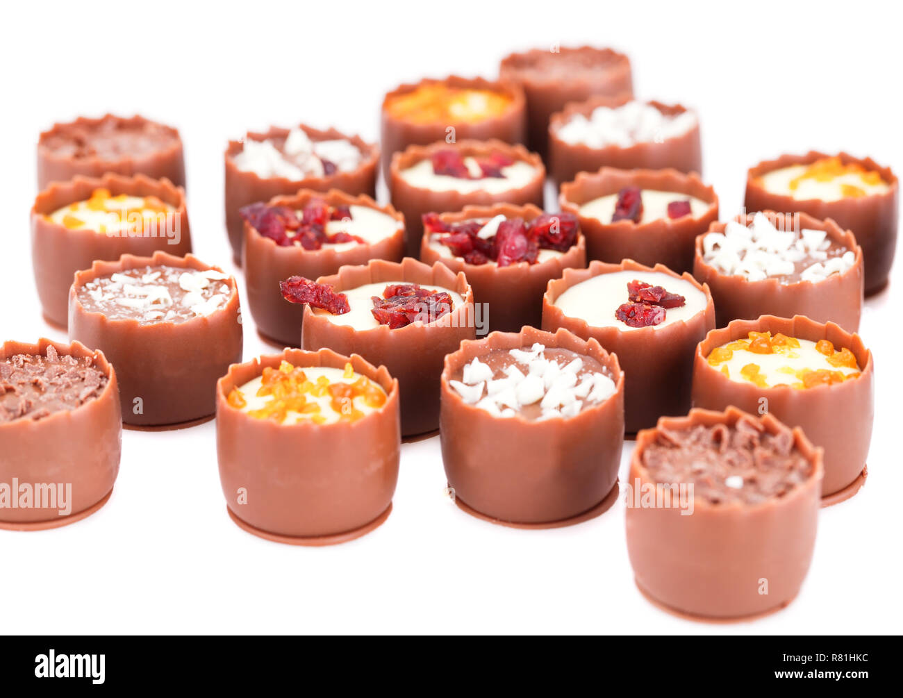Assortment of chocolate on white background Stock Photo - Alamy