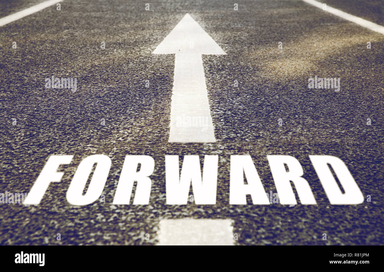 White road marking arrow pointing hi-res stock photography and images ...