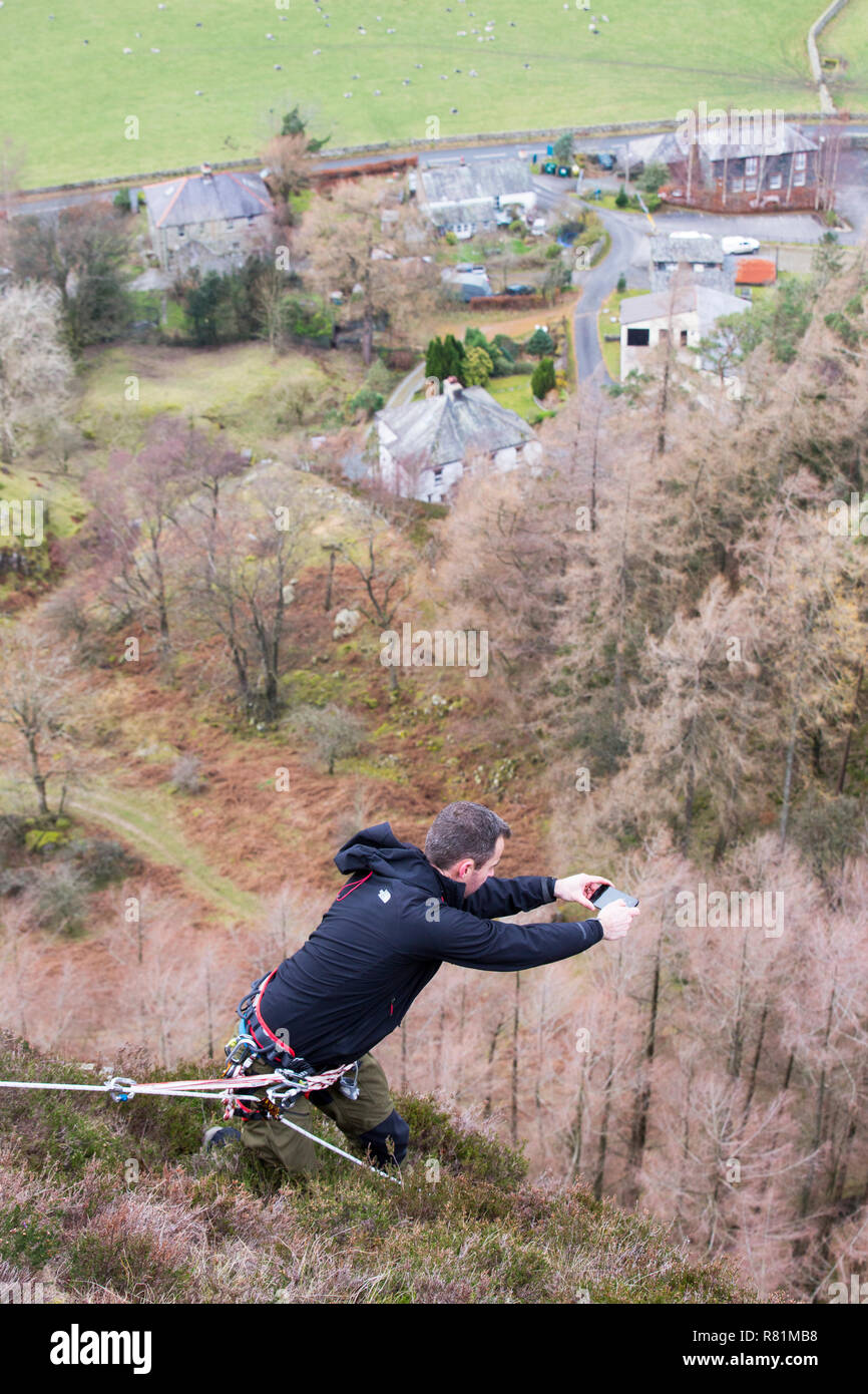 A scientist removes the automatic crack measuring equipment, that ...