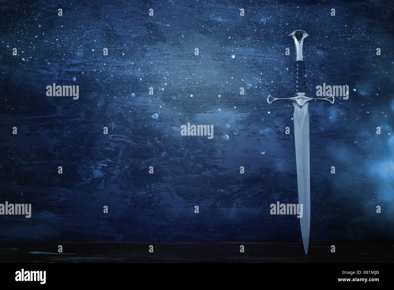 low key banner of silver sword. fantasy medieval period Stock Photo - Alamy
