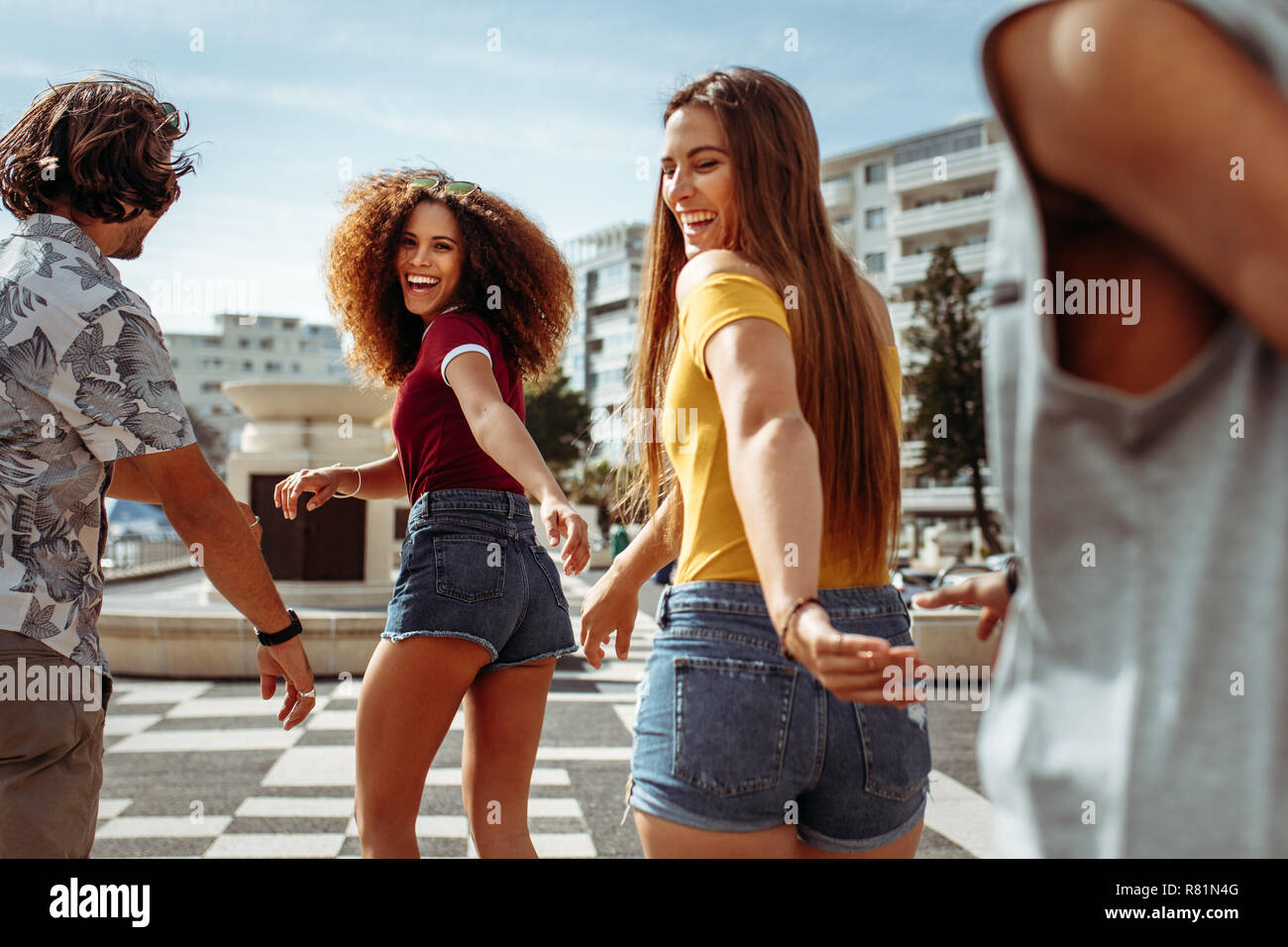 Walking smiling people hi-res stock photography and images - Alamy