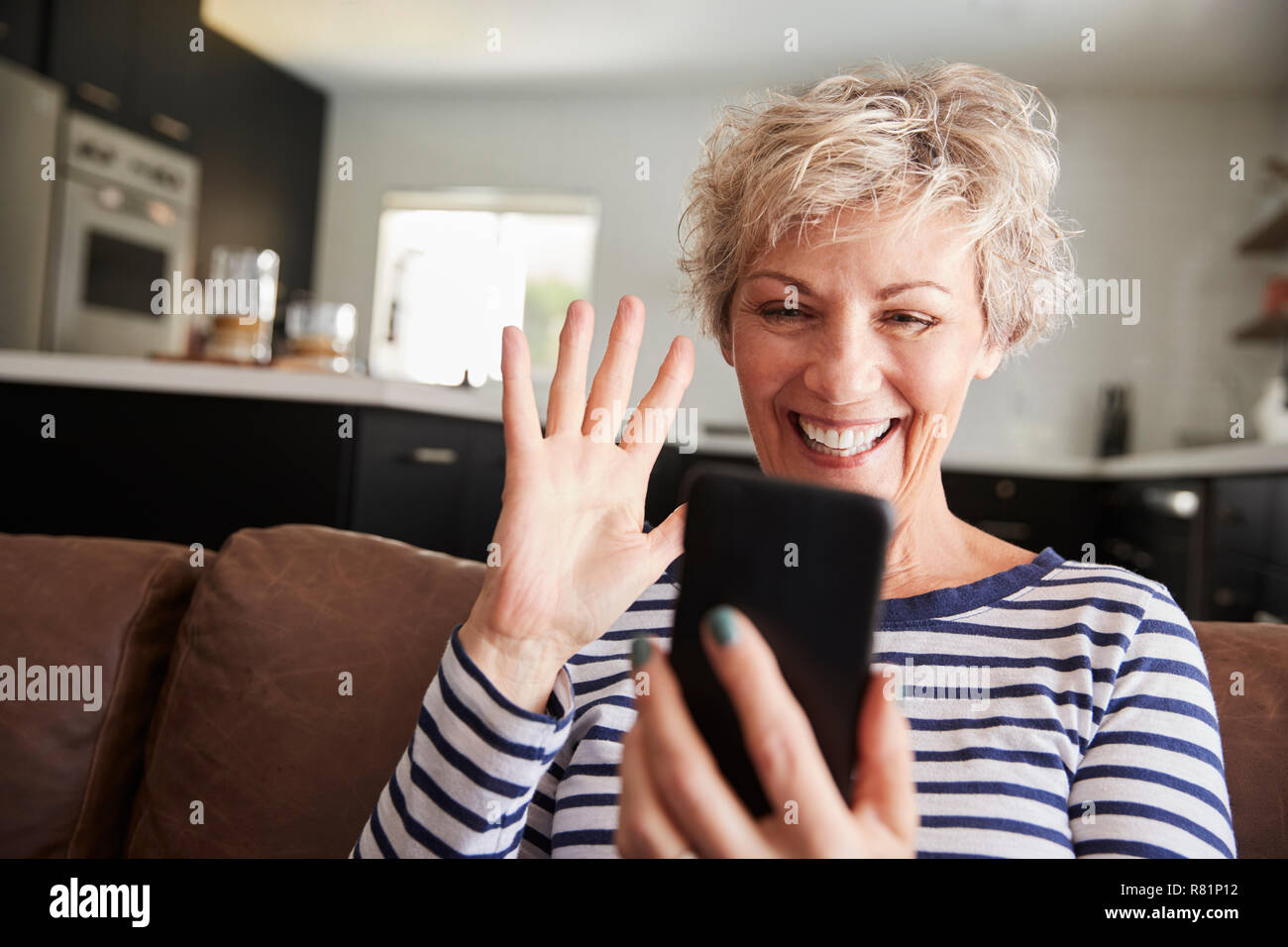 Senior woman using smartphone video hi-res stock photography and images ...
