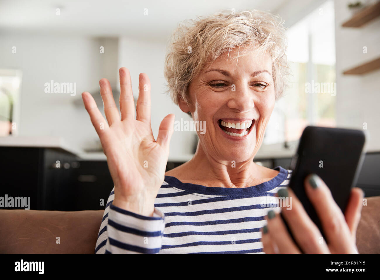 Woman calling home hi-res stock photography and images - Alamy