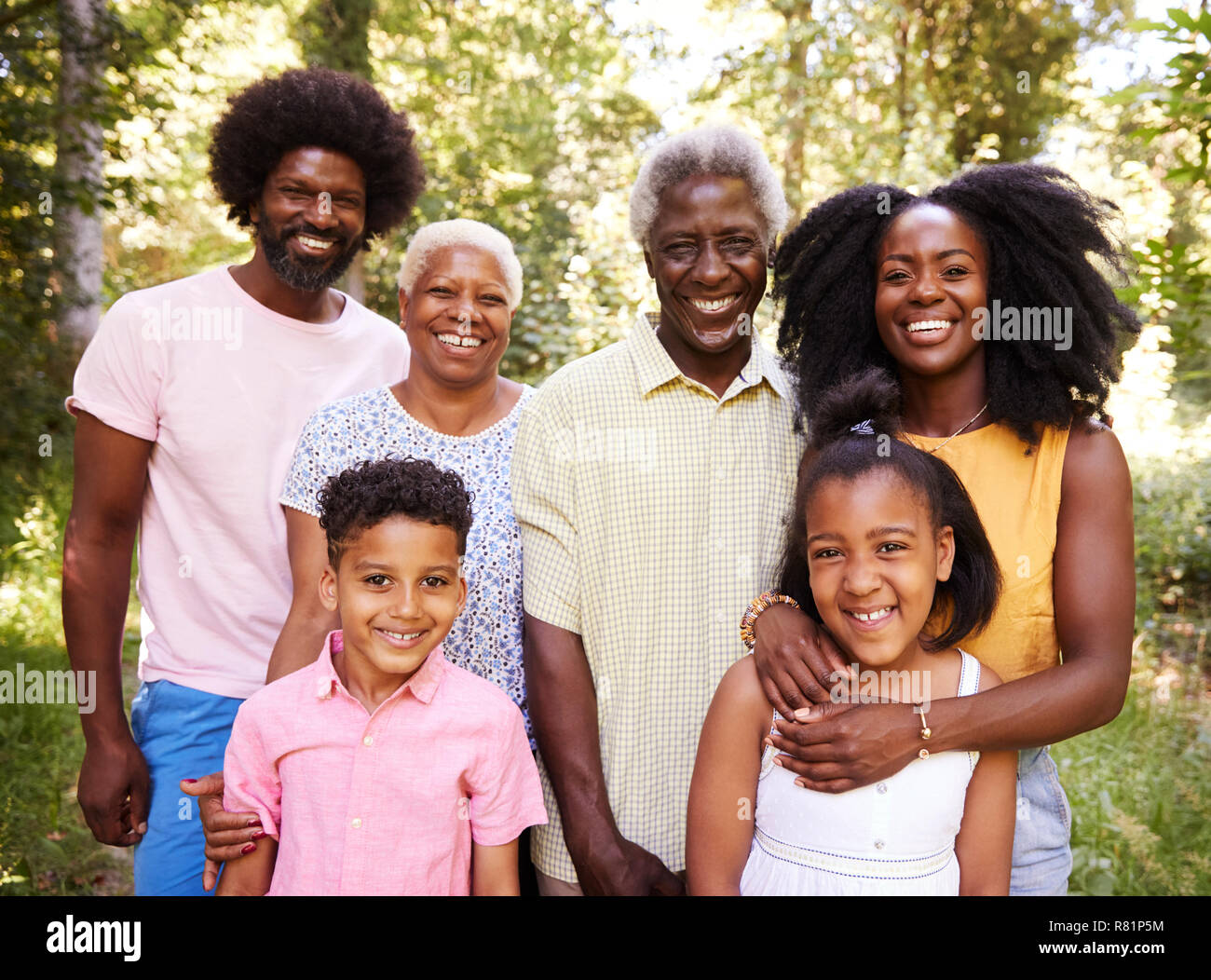 Black family group looking up hi-res stock photography and images - Alamy