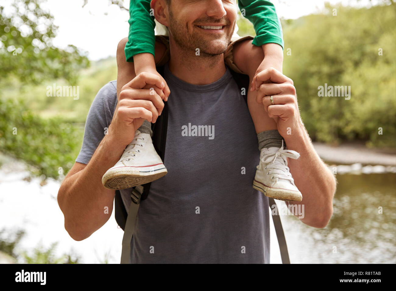 Father carrying son on hike hi-res stock photography and images - Alamy