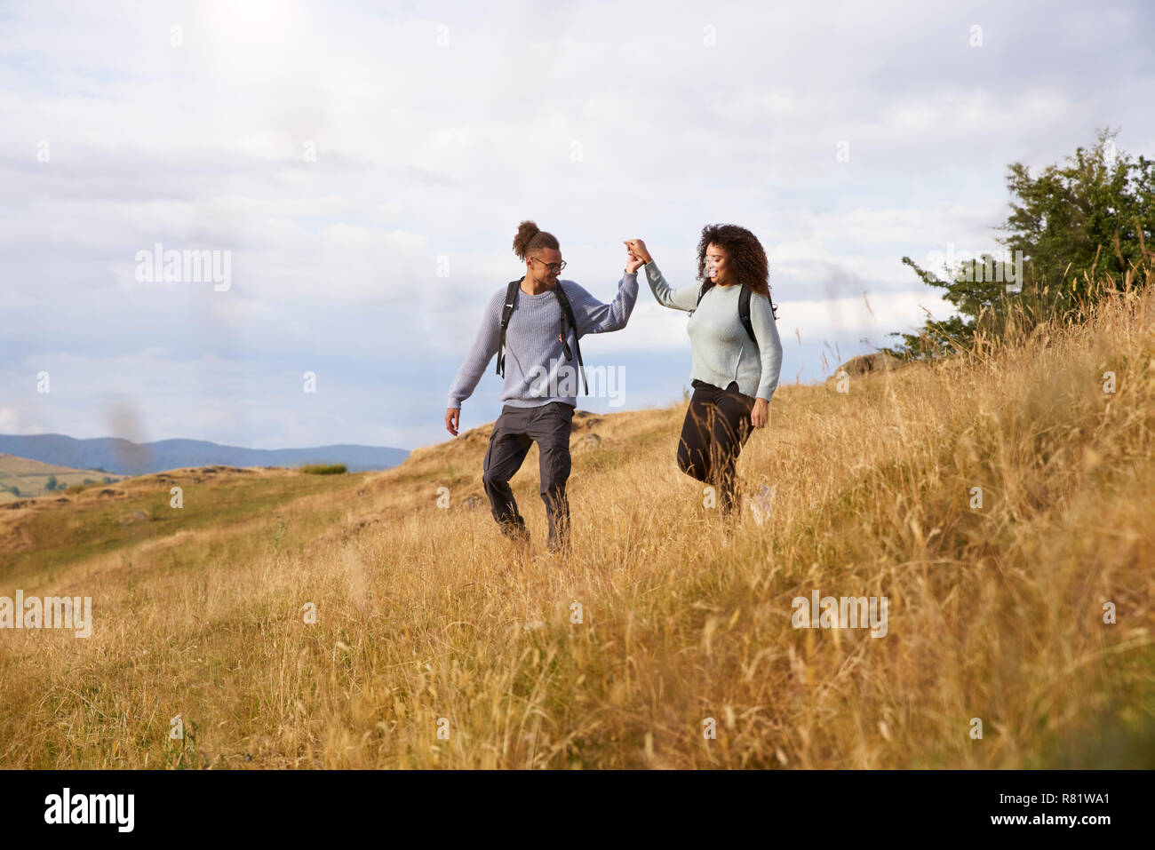 Friends Walking Hand In Hand