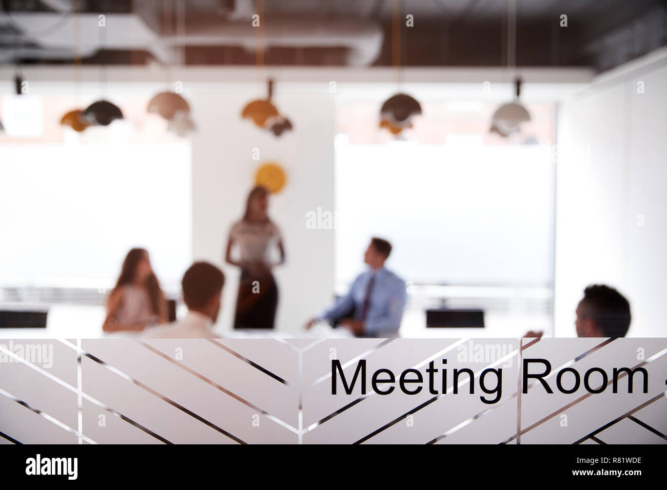 Boardroom Presentation Viewed Through Meeting Room Window Stock Photo ...