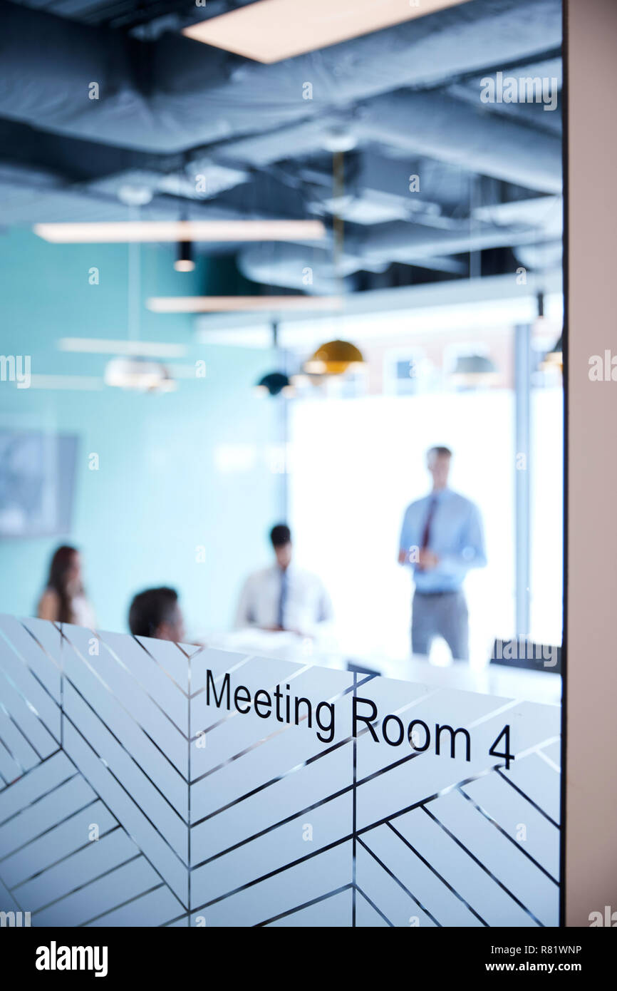 Boardroom Presentation Viewed Through Meeting Room Window Stock Photo ...