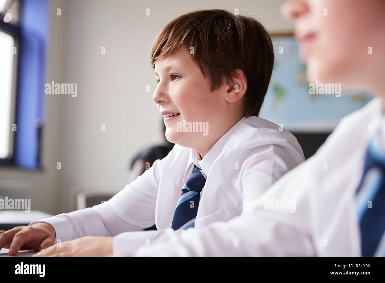 Students working around table at school hi-res stock photography and ...