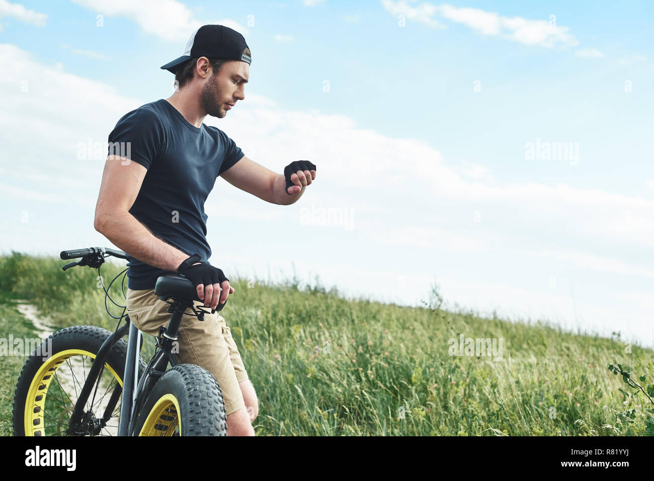 Guy checking hi-res stock photography and images - Alamy