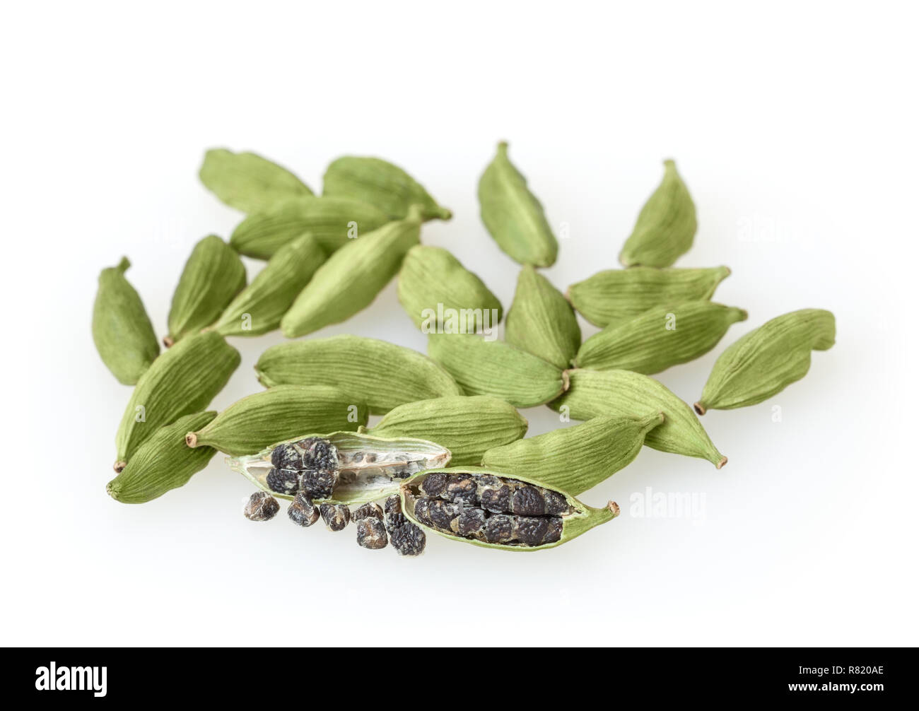 Green cardamon pods isolated on white background Stock Photo - Alamy