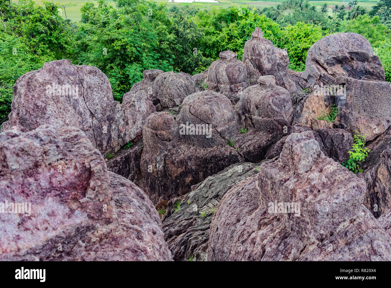 top view of circular shaped big rock at top of a hills looking good ...