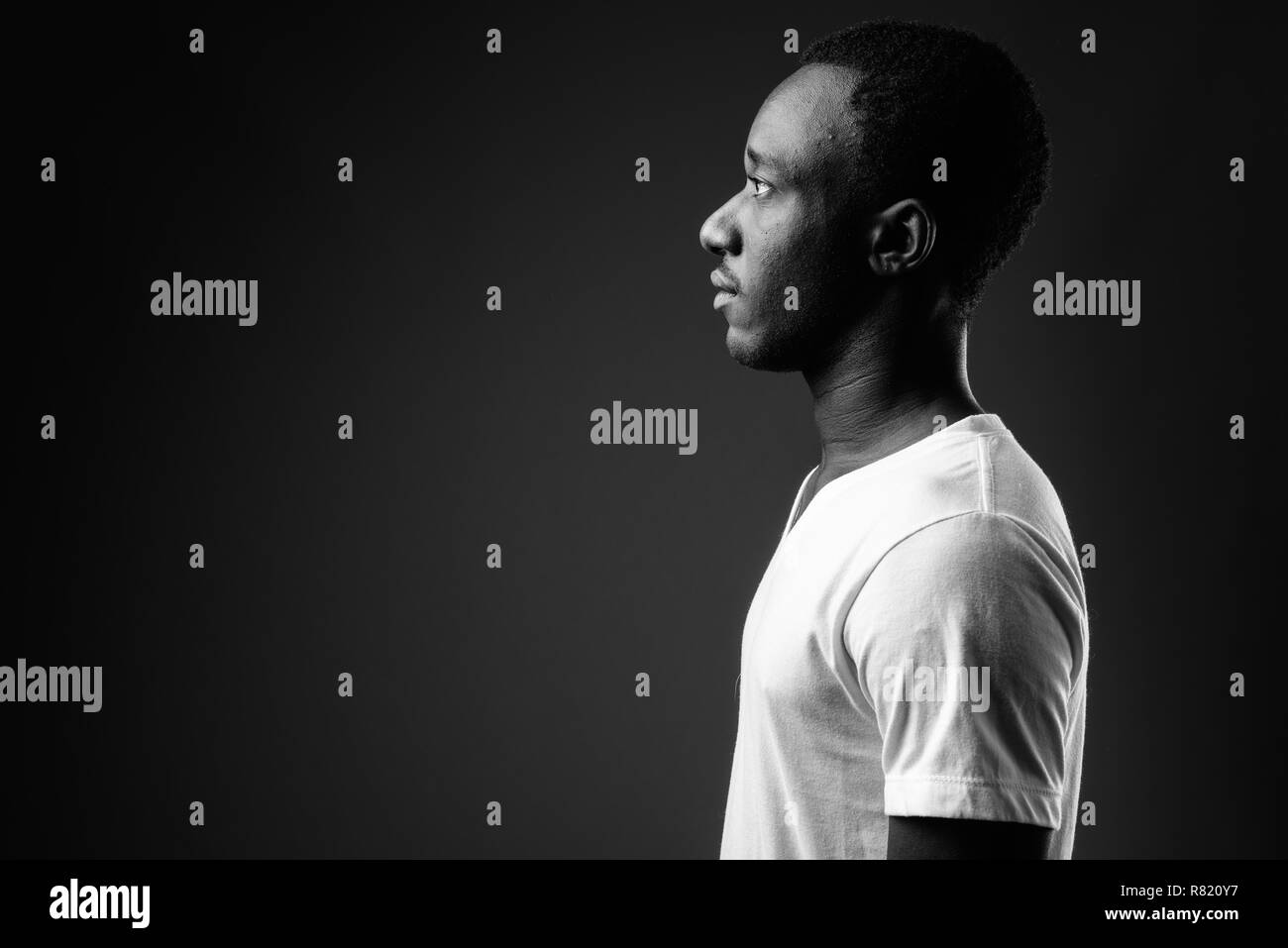 Profile view portrait of young African man in black and white Stock ...
