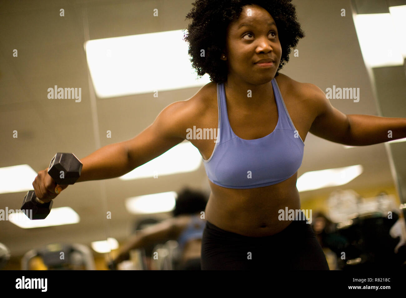 Woman lifting something hi-res stock photography and images - Alamy