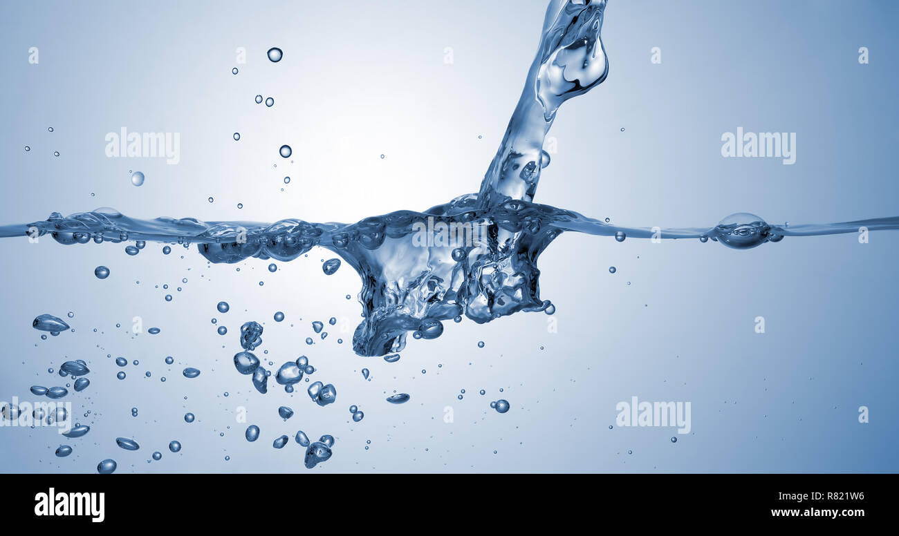 Water splash. Fizzy liquid with bubbles poured into glass vessel Stock ...