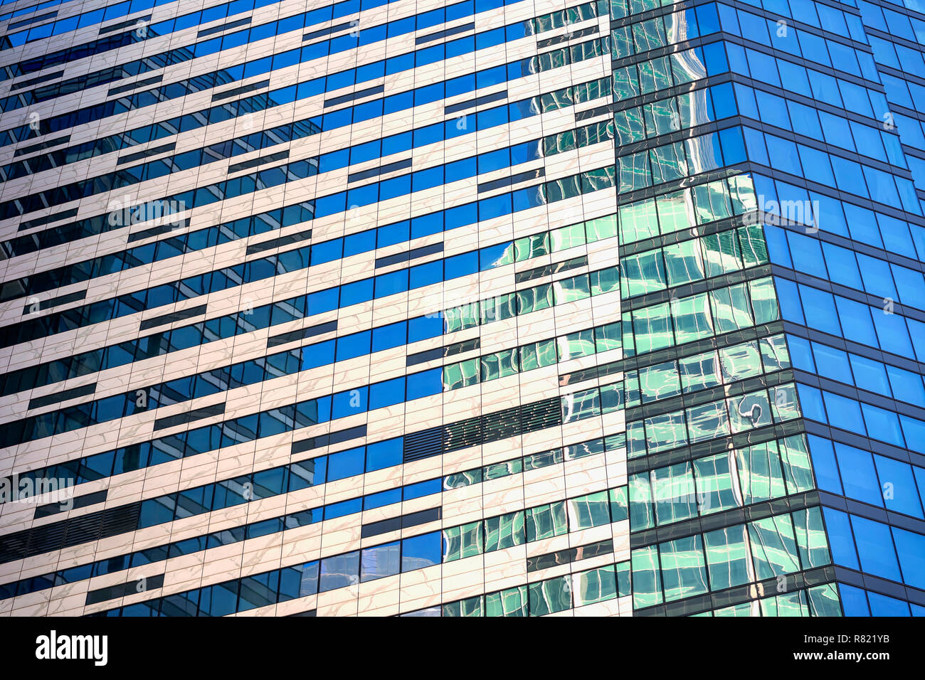 Windows of under construction high-rise building, view of modern glass ...