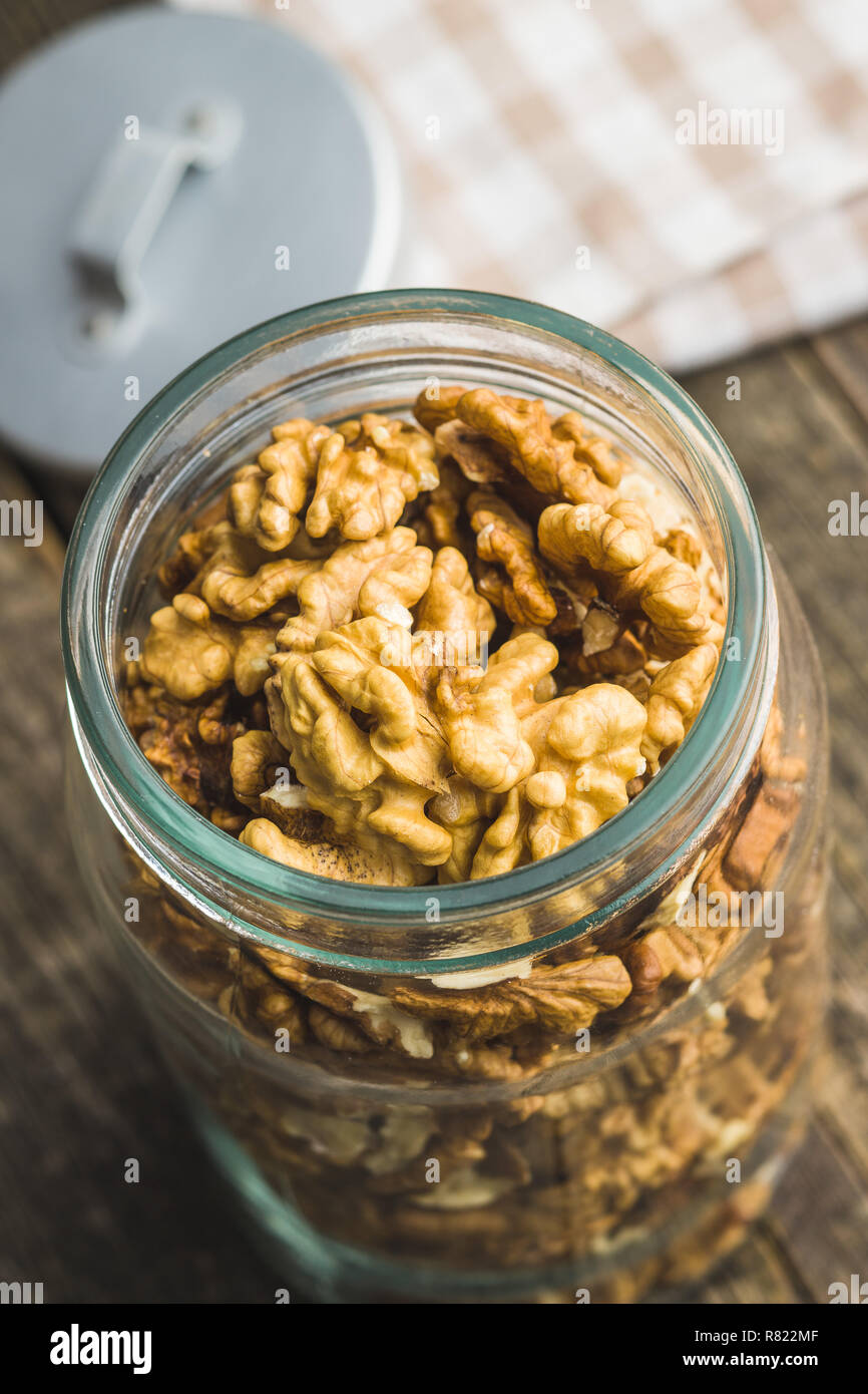 The walnut kernels in jar Stock Photo - Alamy