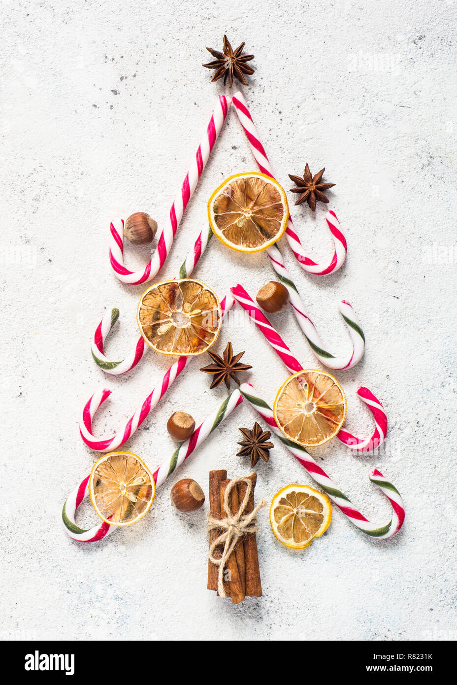 Creative christmas fir tree made from candy, spices and nuts Stock ...