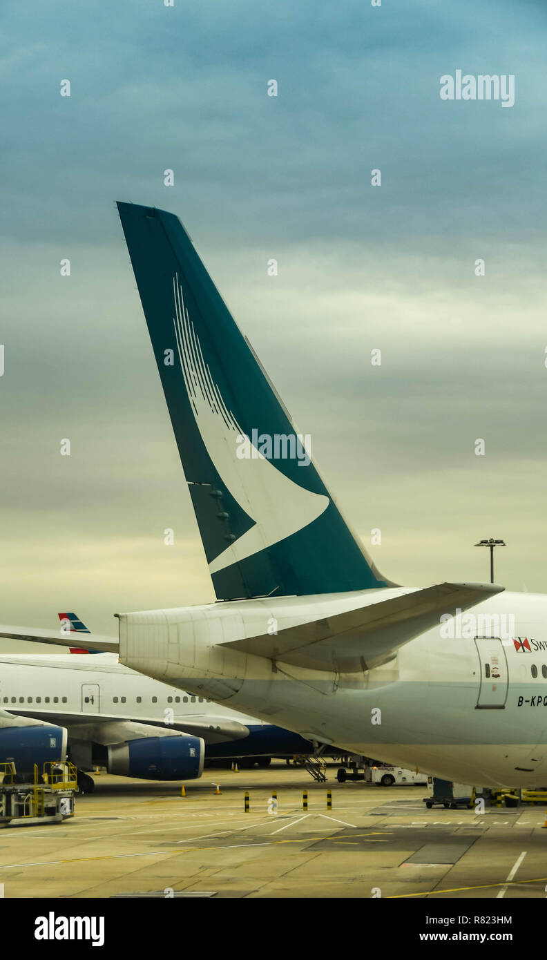 LONDON, ENGLAND - JUNE 2018: Tail fin of a Cathay Pacific Boeing 777 at ...