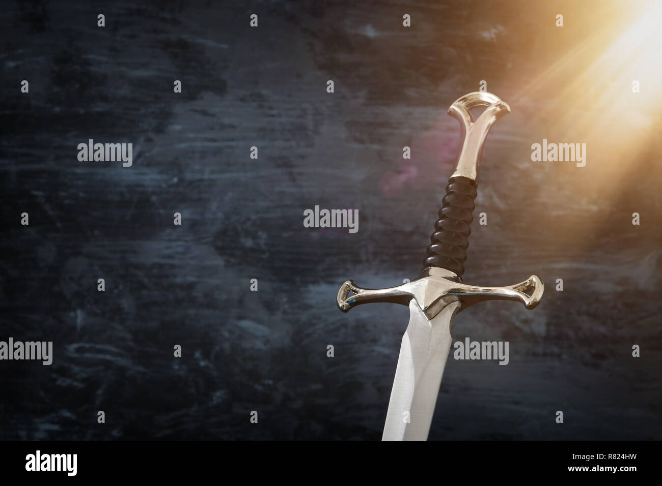 low key image of silver sword. fantasy medieval period Stock Photo - Alamy
