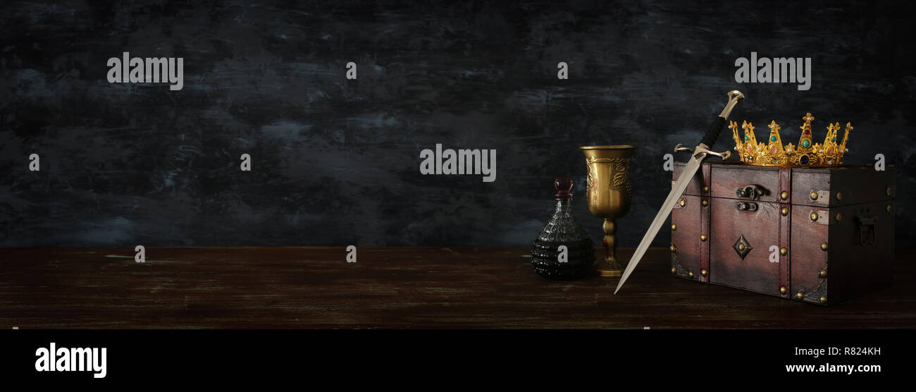 low key banner of beautiful queen/king crown, chest and sword. fantasy ...