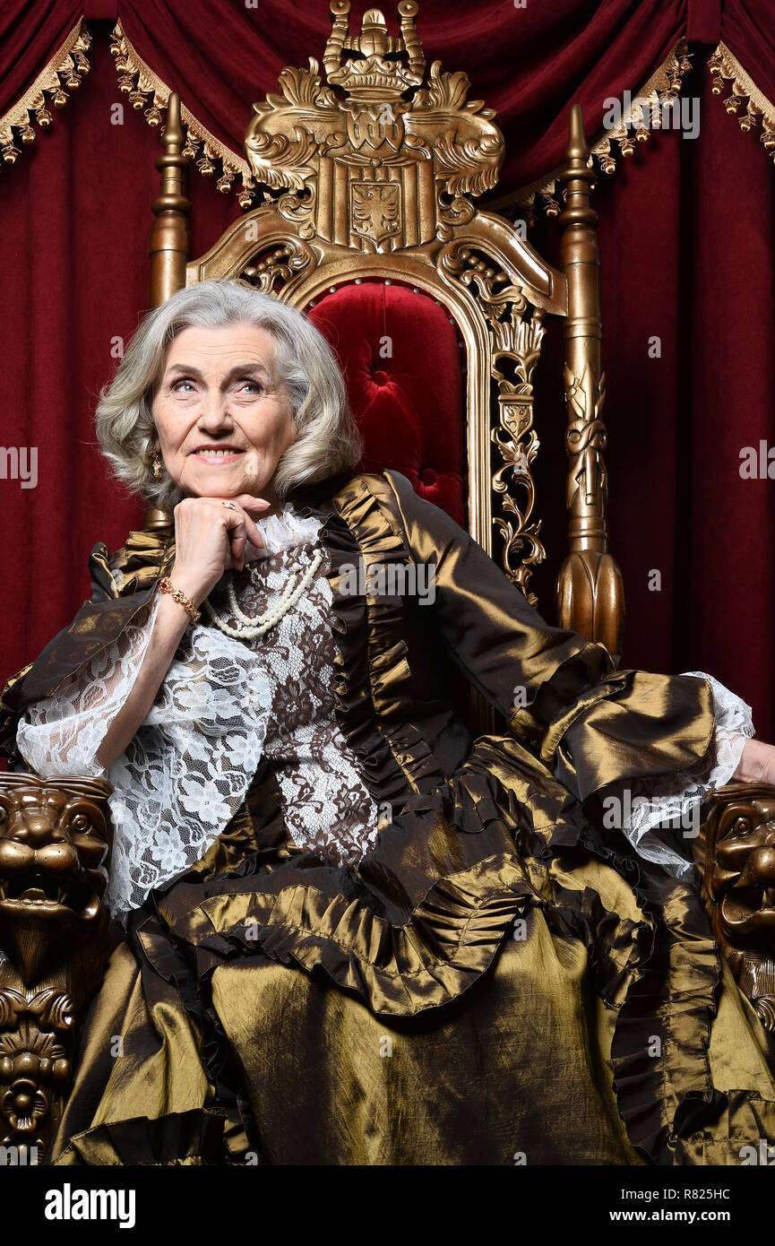 Queen on throne hi-res stock photography and images - Alamy