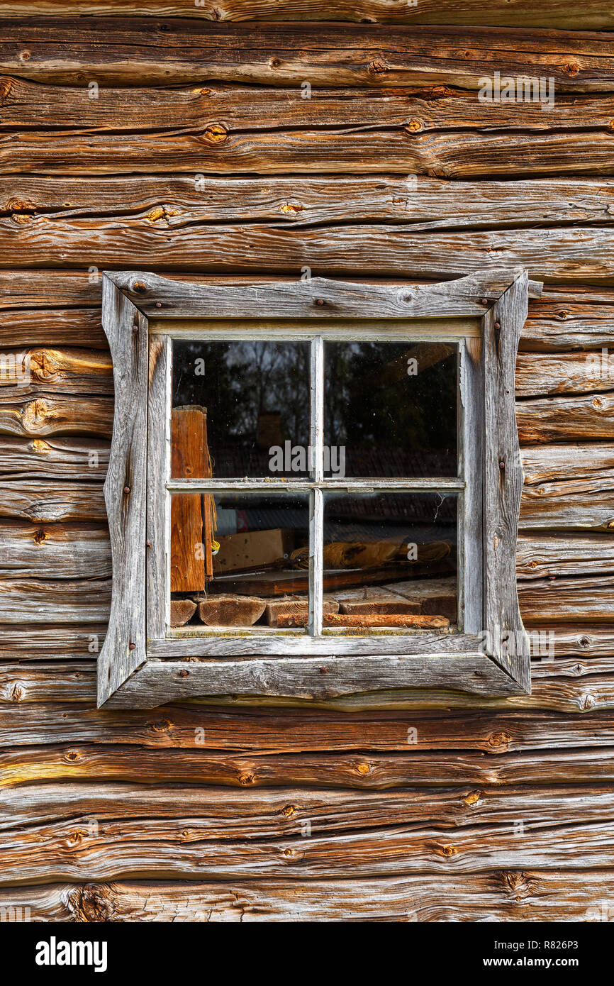 Old weathered window on a log house Stock Photo - Alamy