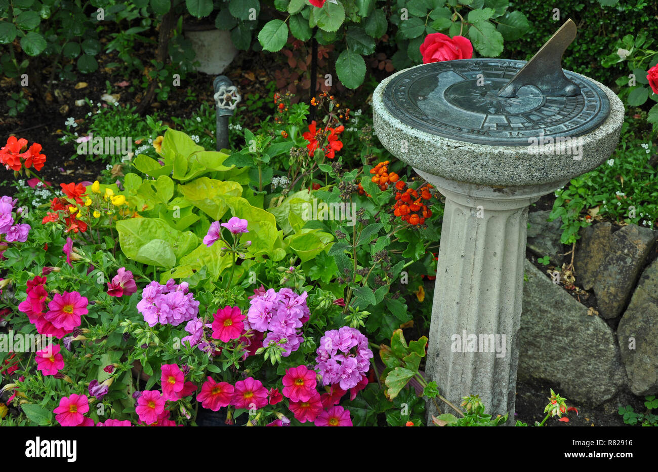 Decorative garden sundial Stock Photo - Alamy